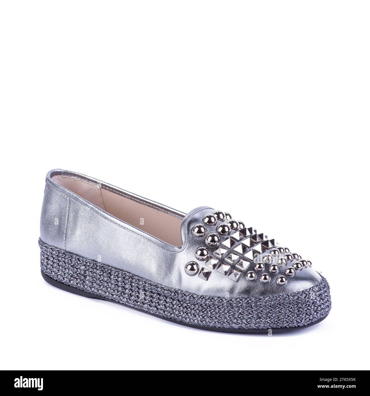 Side view of trendy women's metallic leather shoe covered with various ...