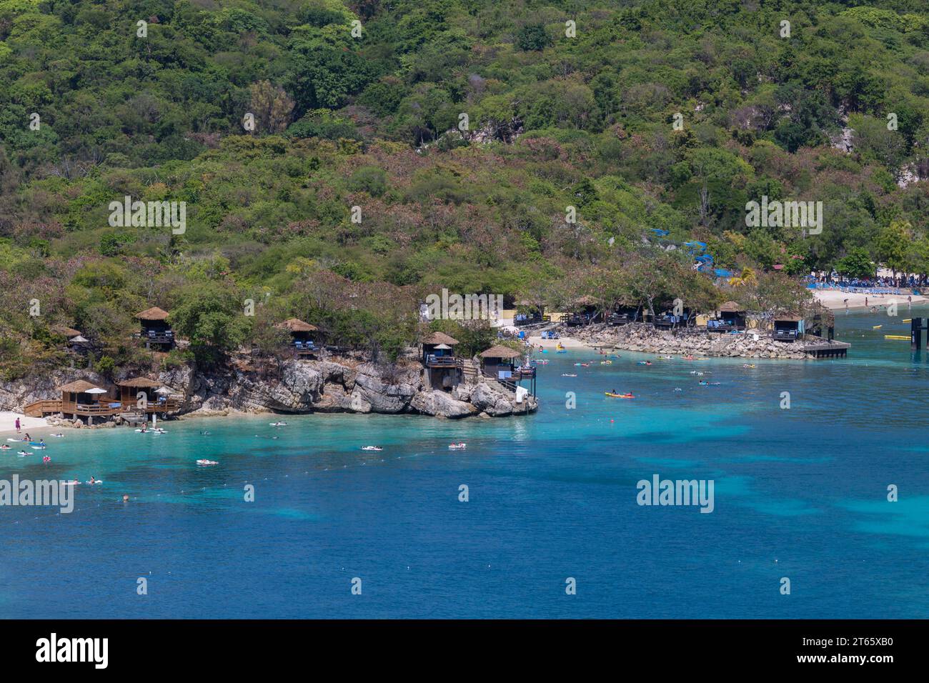 Private cabanas on the rocky shoreline of Royal Caribbean's private ...