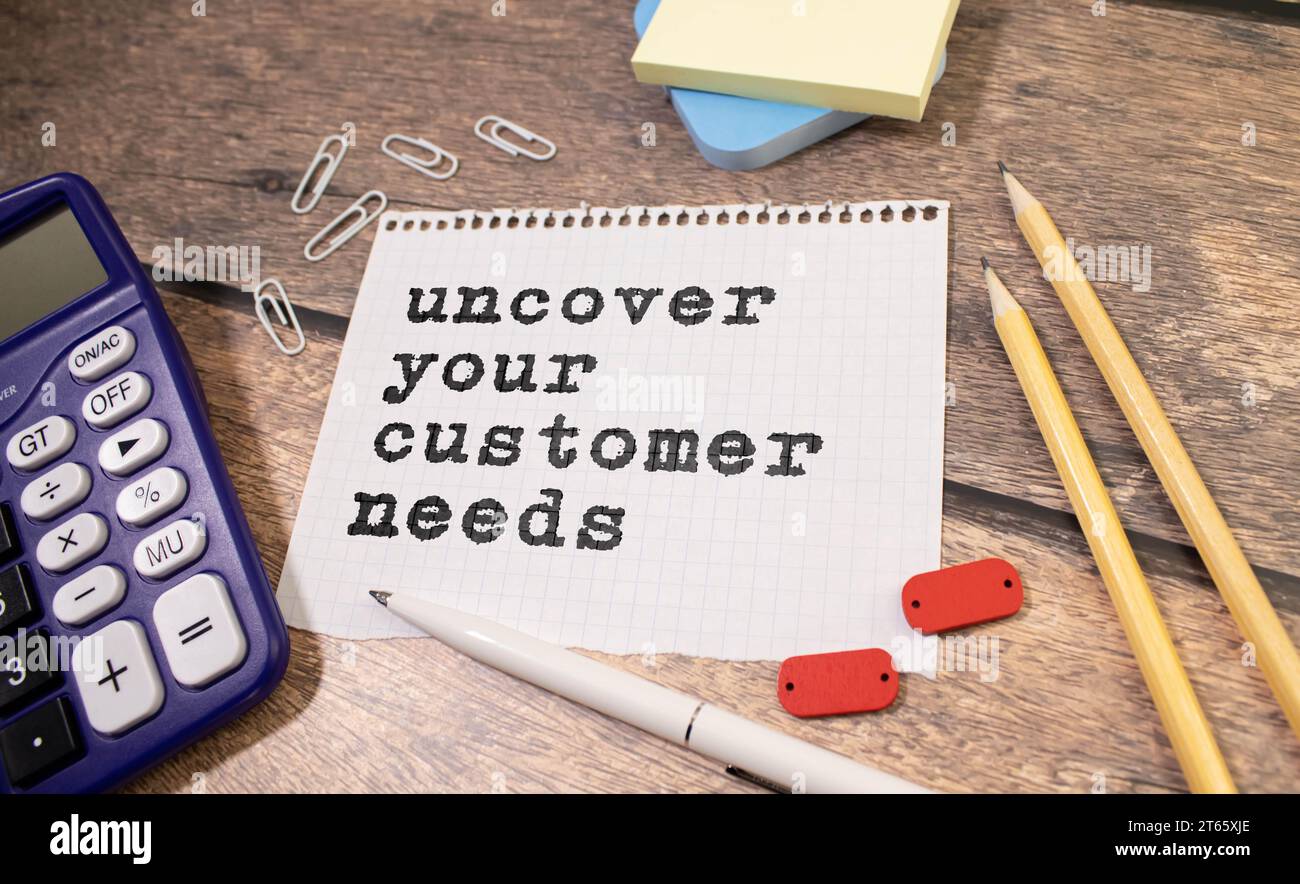 Uncover Your Customer Needs . gray and yellow background. text on white ... Uncover Your Customer Needs . gray and yellow background. text on white ...