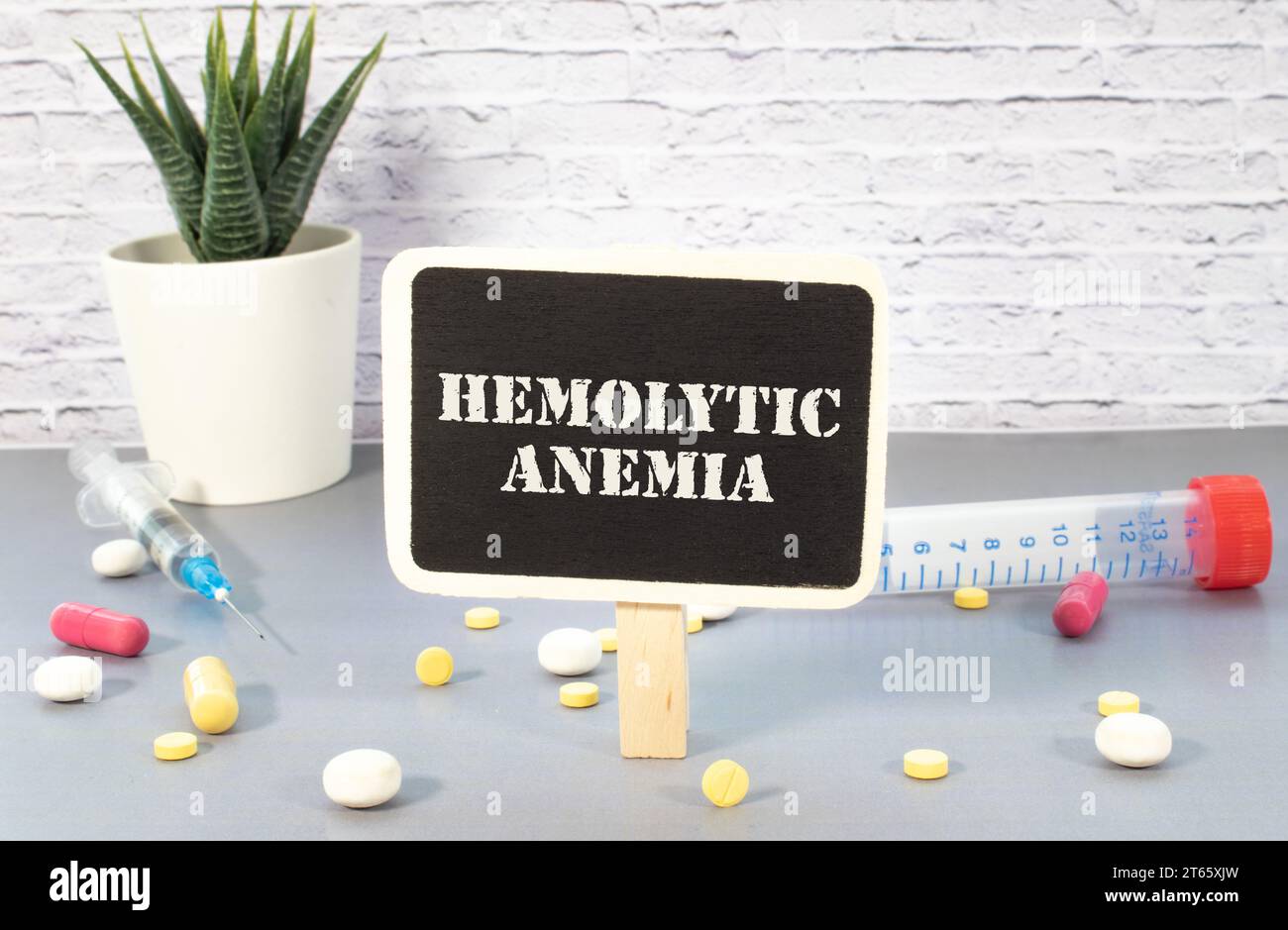 Medical concept. On a blue background, pills, capsules and puzzles with ...