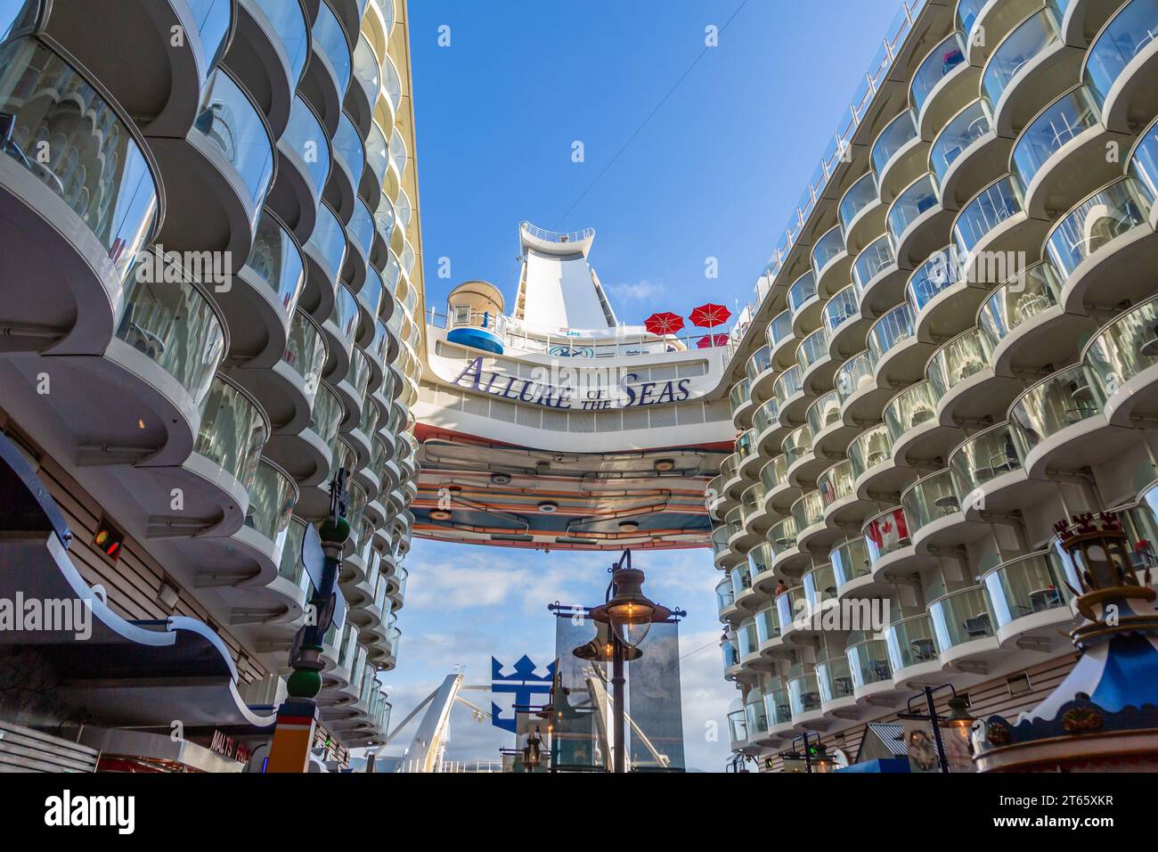 Balconies line each side of the Boardwalk of the Royal Caribbean Allure ...