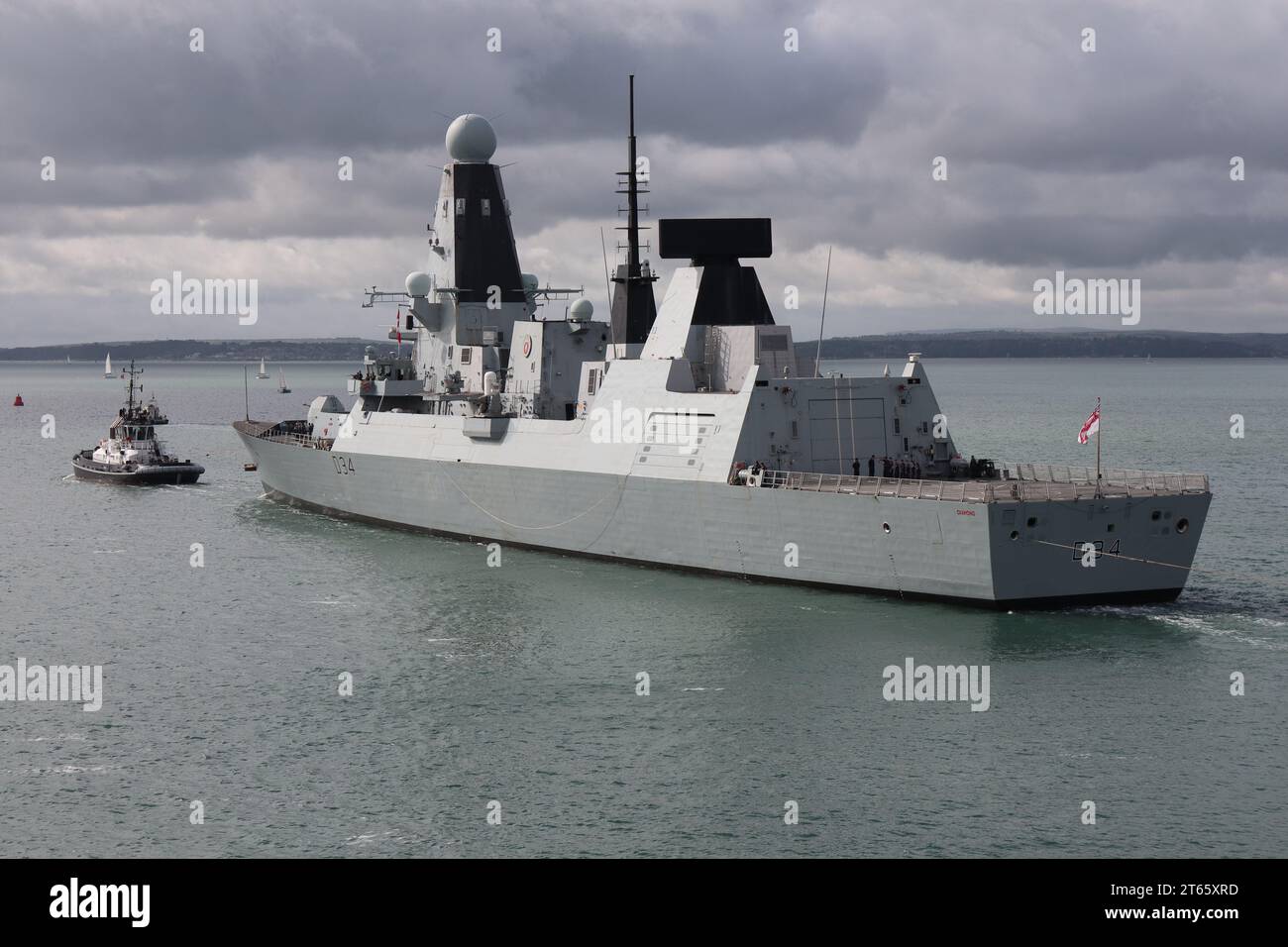 The tug BOUNTIFUL escorts the Royal Navy Type 45 air defence destroyer ...