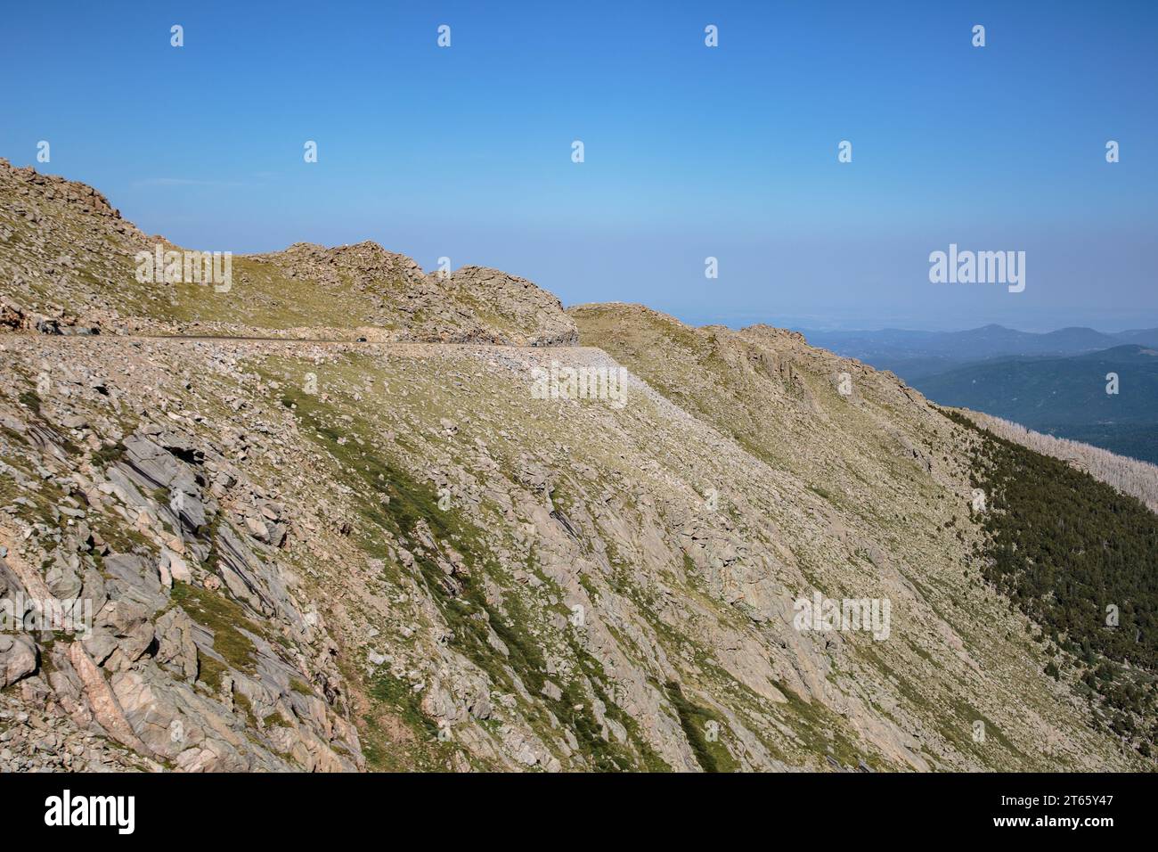 Mount Evans Scenic Byway winding down the mountainside above the tundra ...