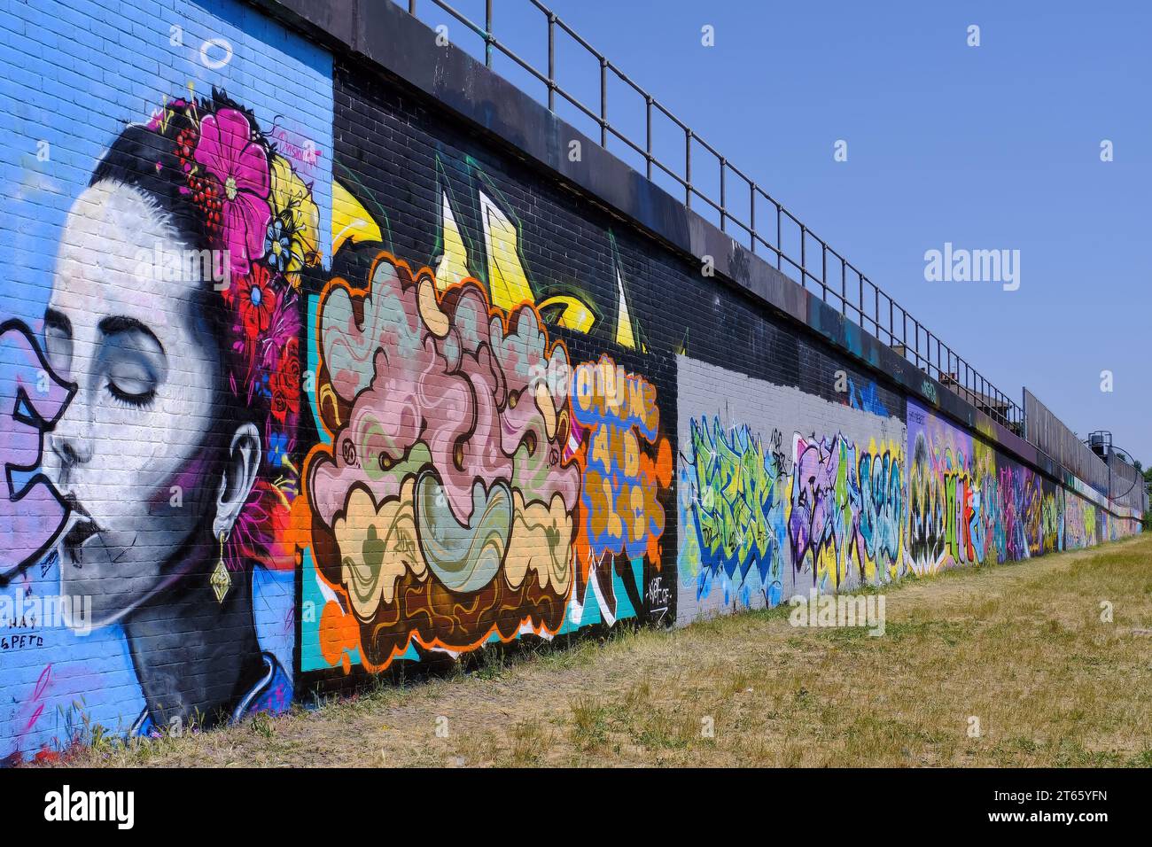 Colourful street art and graffiti along railway at Fleet Street Hill ...