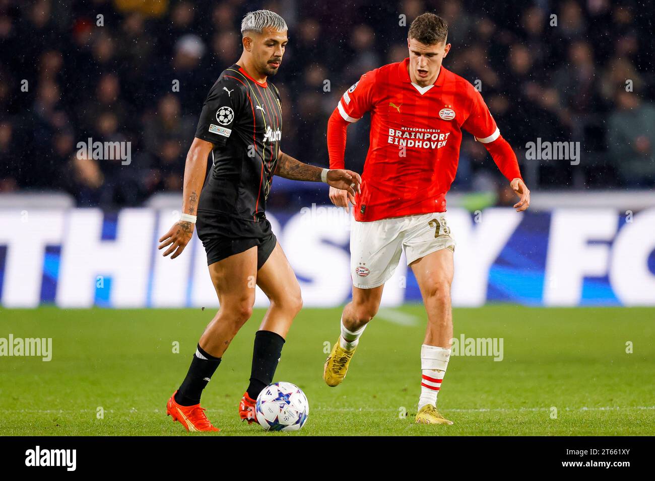 EINDHOVEN, NETHERLANDS - NOVEMBER 8: Facundo Medina (RC Lens) and Guus ...