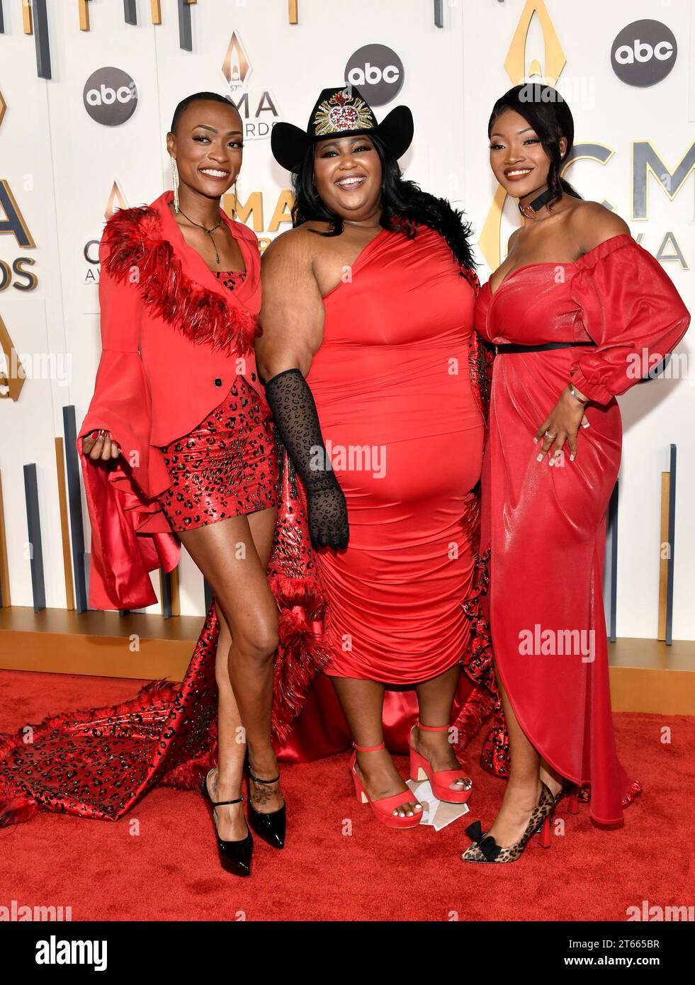 Trea Swindle, from left, Danica Hart, and Devynn Hart of Chapel Hart arrive at the 57th Annual ...