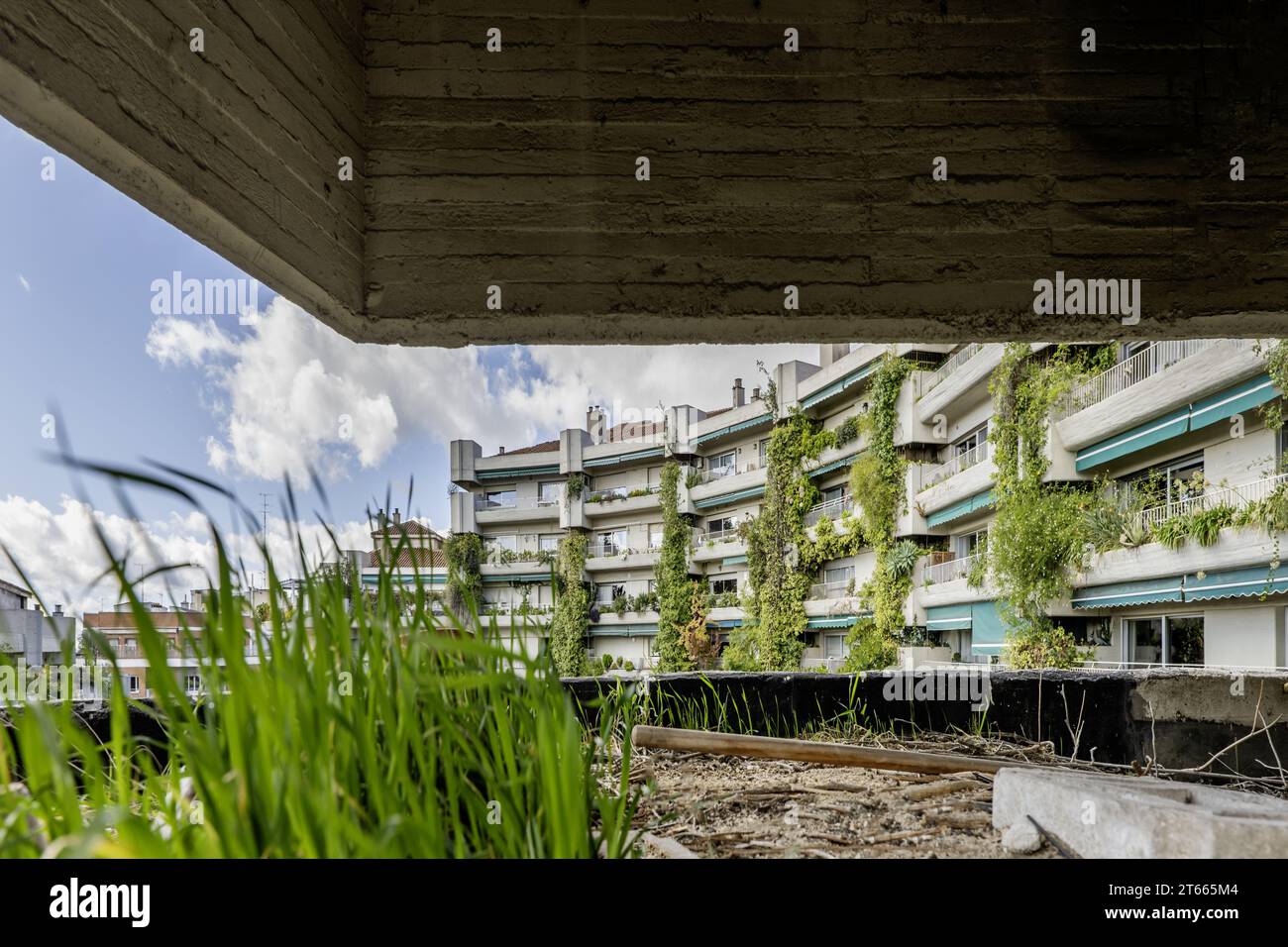 Views of a large flowerpot integrated into the façade Stock Photo - Alamy