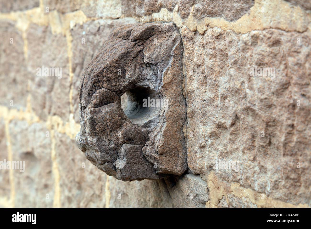 Rope piercing on the rock wall Stock Photo - Alamy