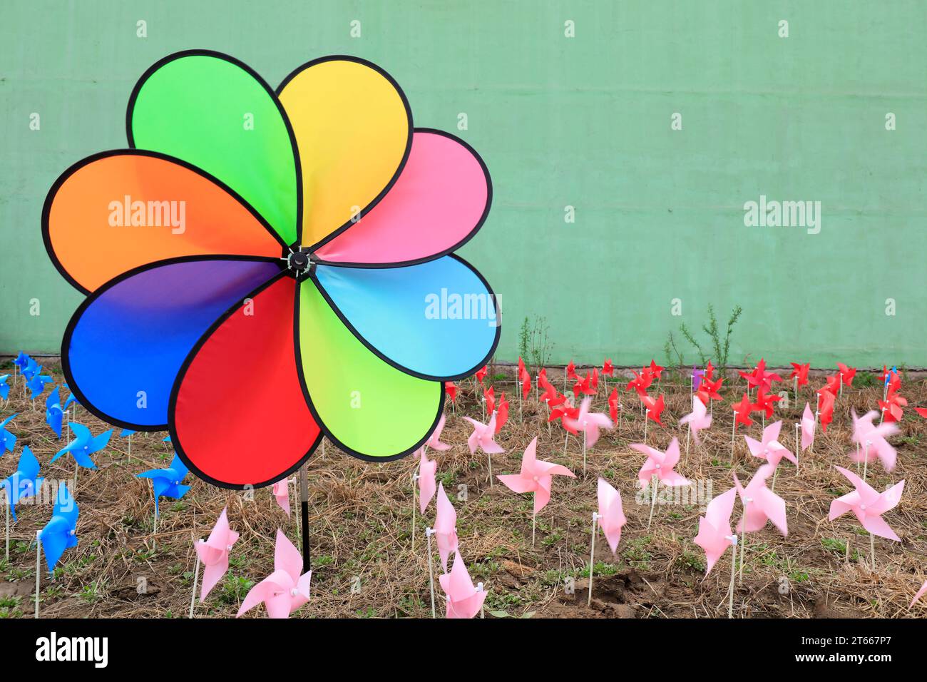 Color windmill in the park Stock Photo - Alamy
