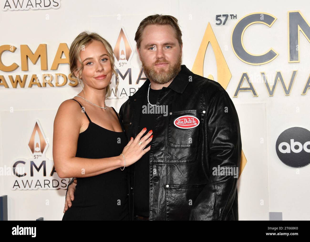 Delaney Royer, left, and ERNEST arrive at the 57th Annual CMA Awards on ...