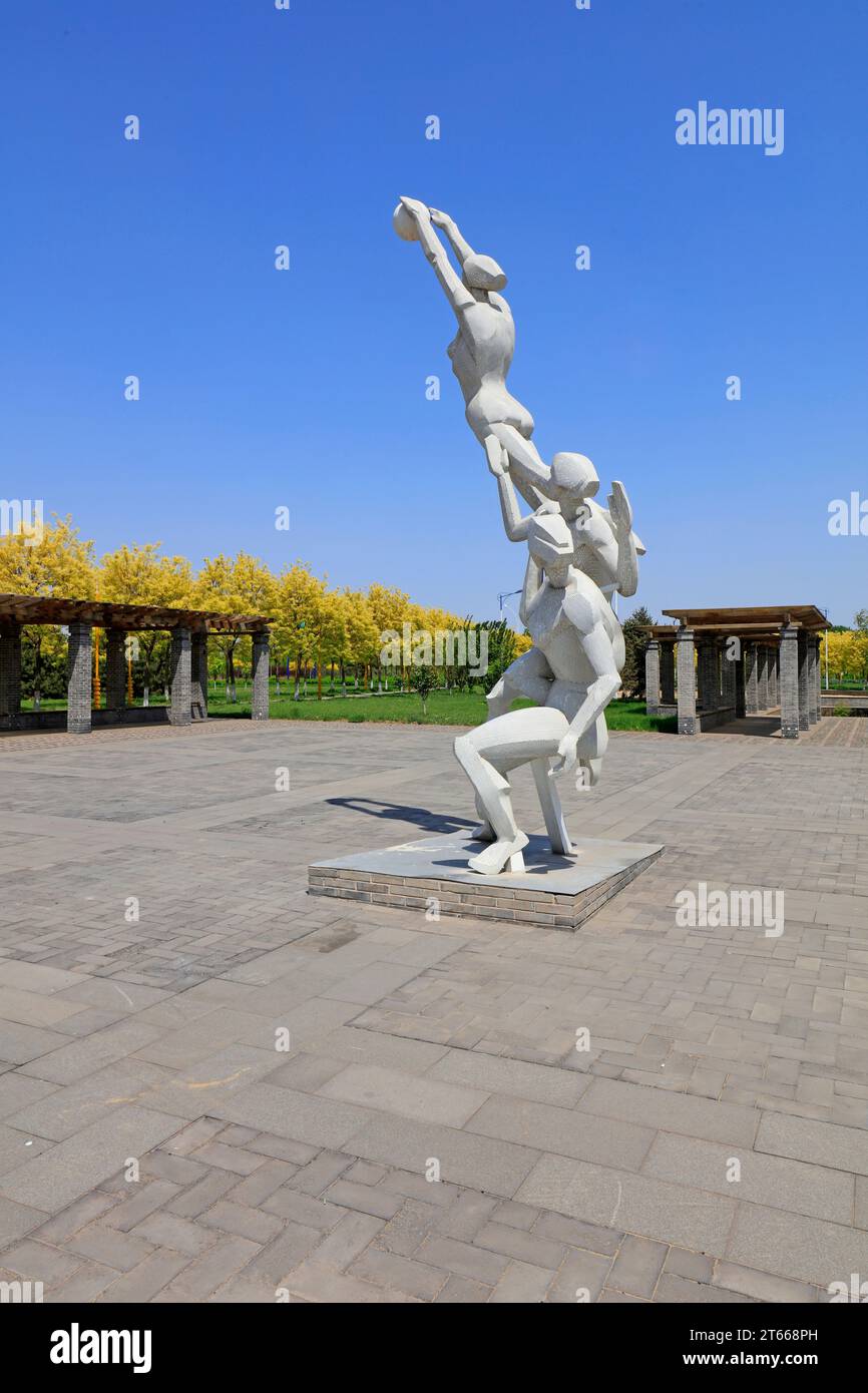 Volleyball player sculpture in the park, Tangshan, China Stock Photo ...