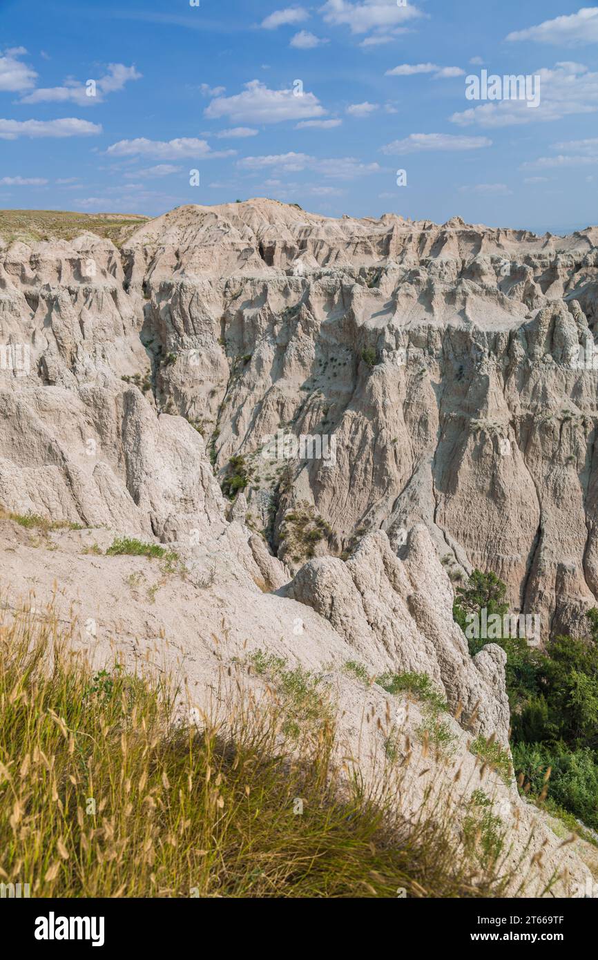 Erosion exposes layers of sedimentary rock in the Badlands National ...