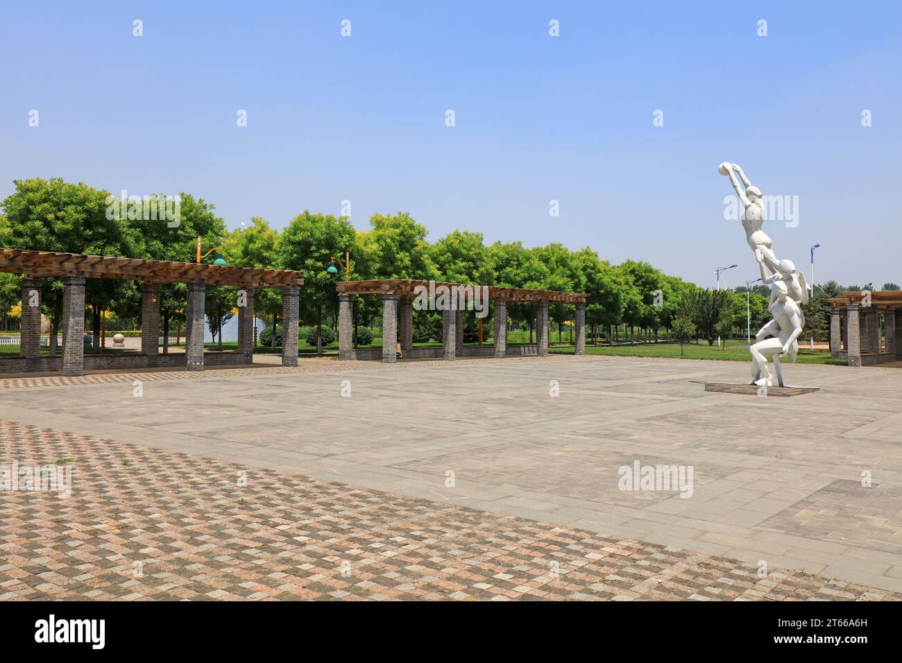 Volleyball player sculpture in the park, China Stock Photo - Alamy