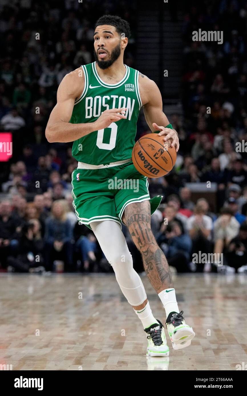 Boston Celtics forward Jayson Tatum (0) dribbles down the court during ...