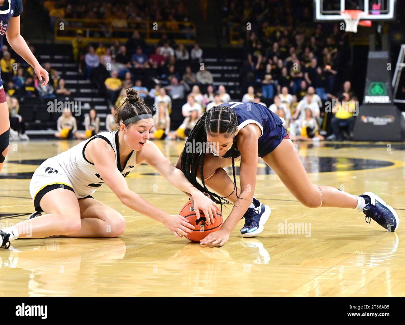 IOWA CITY, IA - NOVEMBER 06: Iowa guard Taylor McCabe (2) and Fairleigh ...