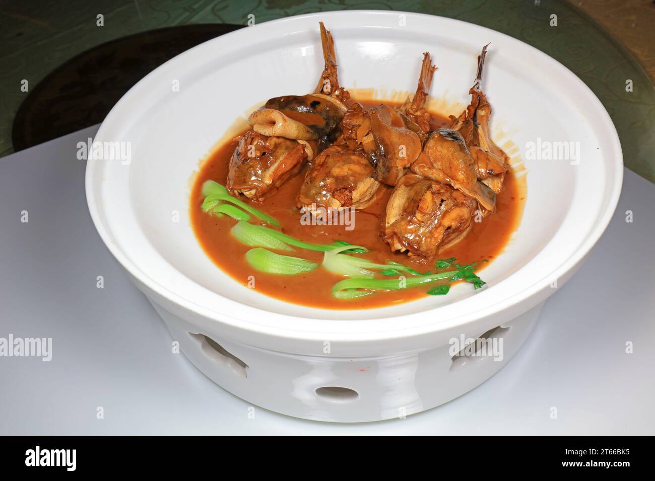 Traditional Chinese dishes, Stewed puffer fish with sauce Stock Photo ...