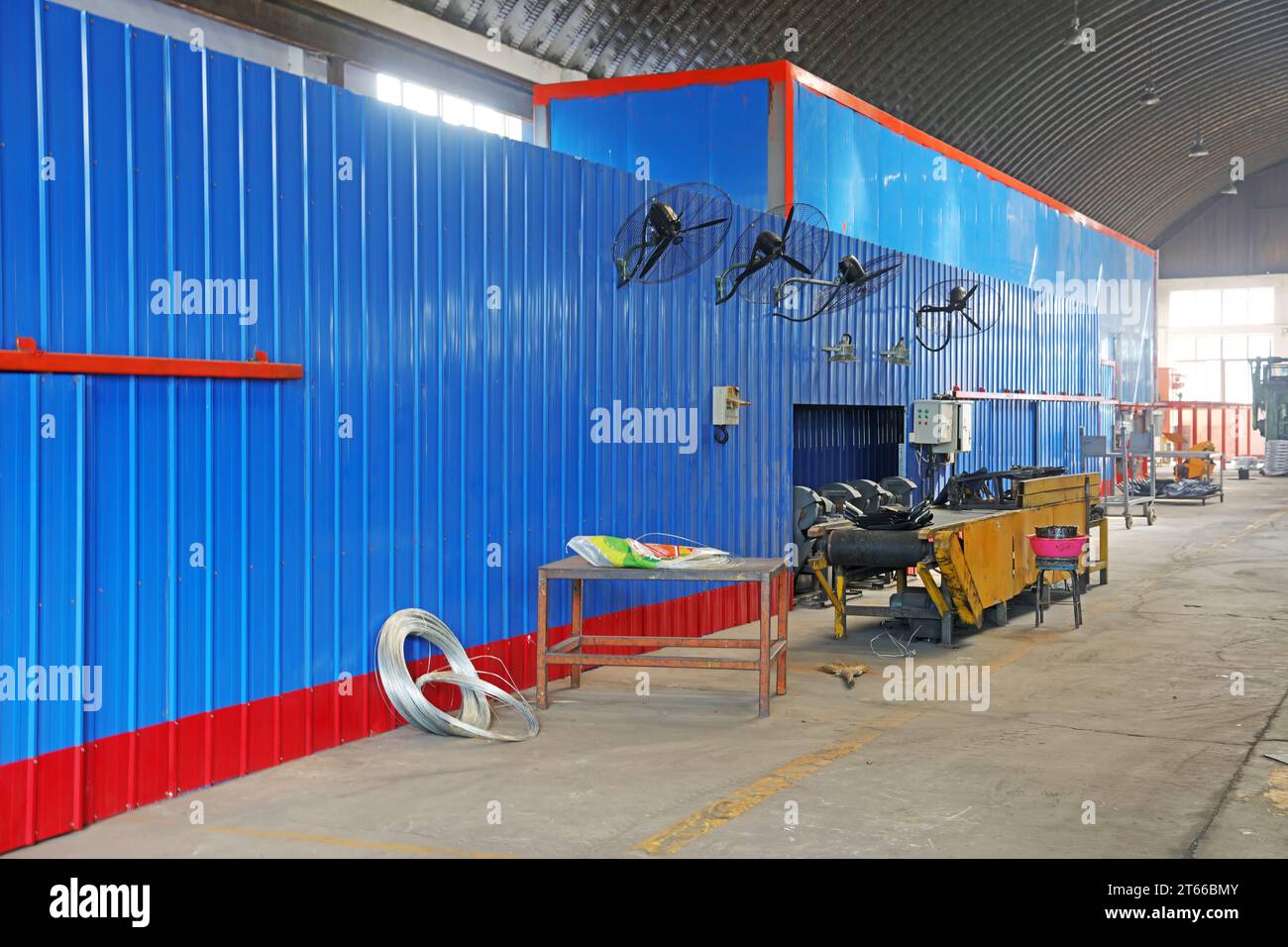 Spray production line in a factory Stock Photo - Alamy