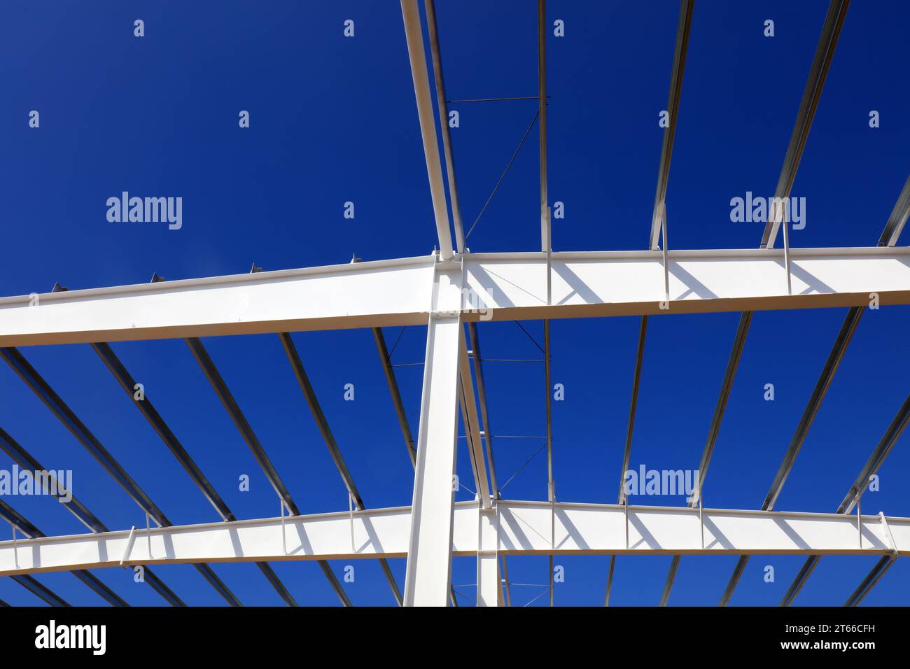 A white steel beam under the blue sky Stock Photo - Alamy