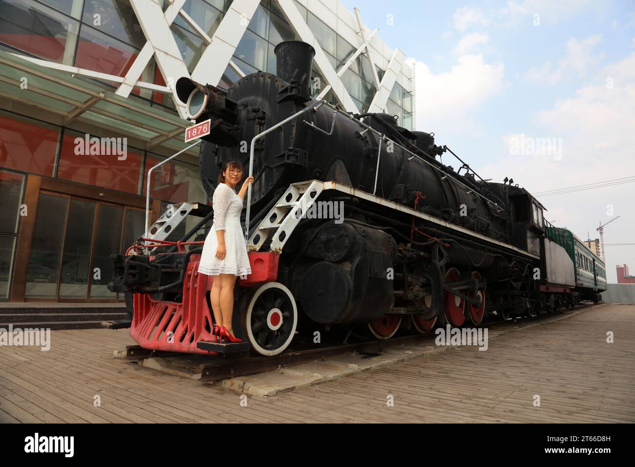 Tangshan - September 2, 2017: A beautiful girl is standing in the front ...