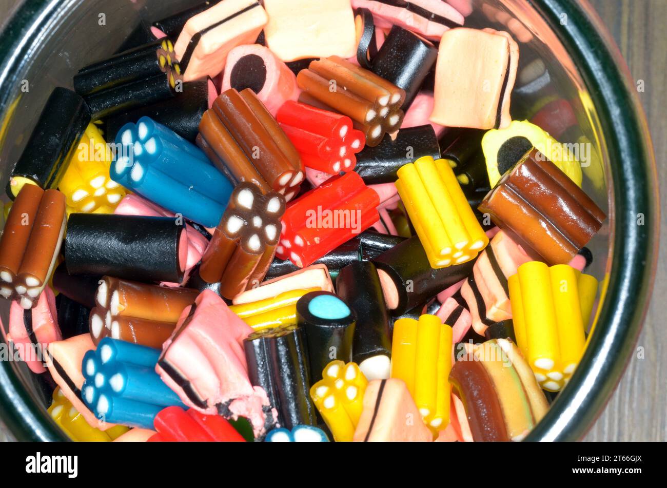 A close up shot for an assortment of liquorice candy in a glass jar ...