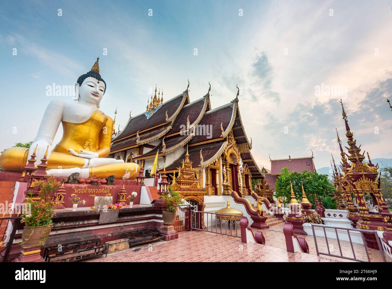The large gold and white iconic statue of the seated Buddha,overlooking ...