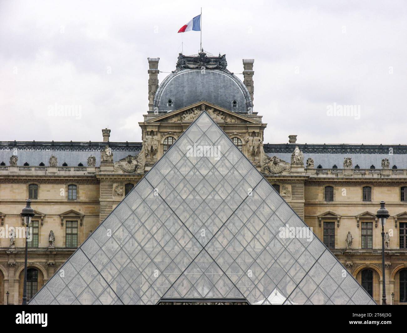 The Louvre and its Pyramid in Paris, France Stock Photo - Alamy