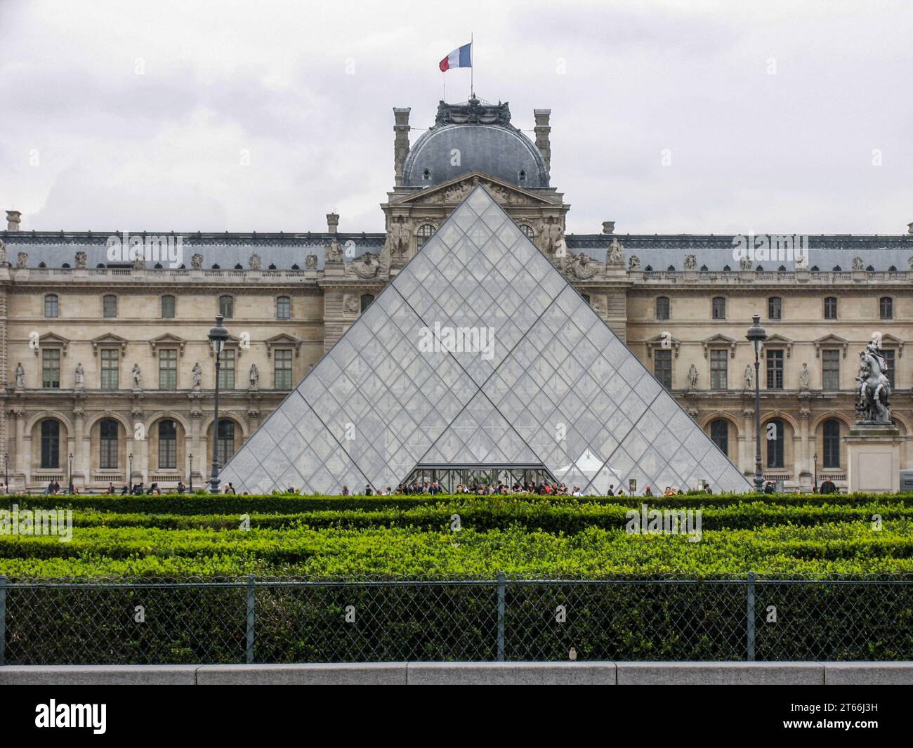 The Louvre and its Pyramid in Paris, France Stock Photo - Alamy