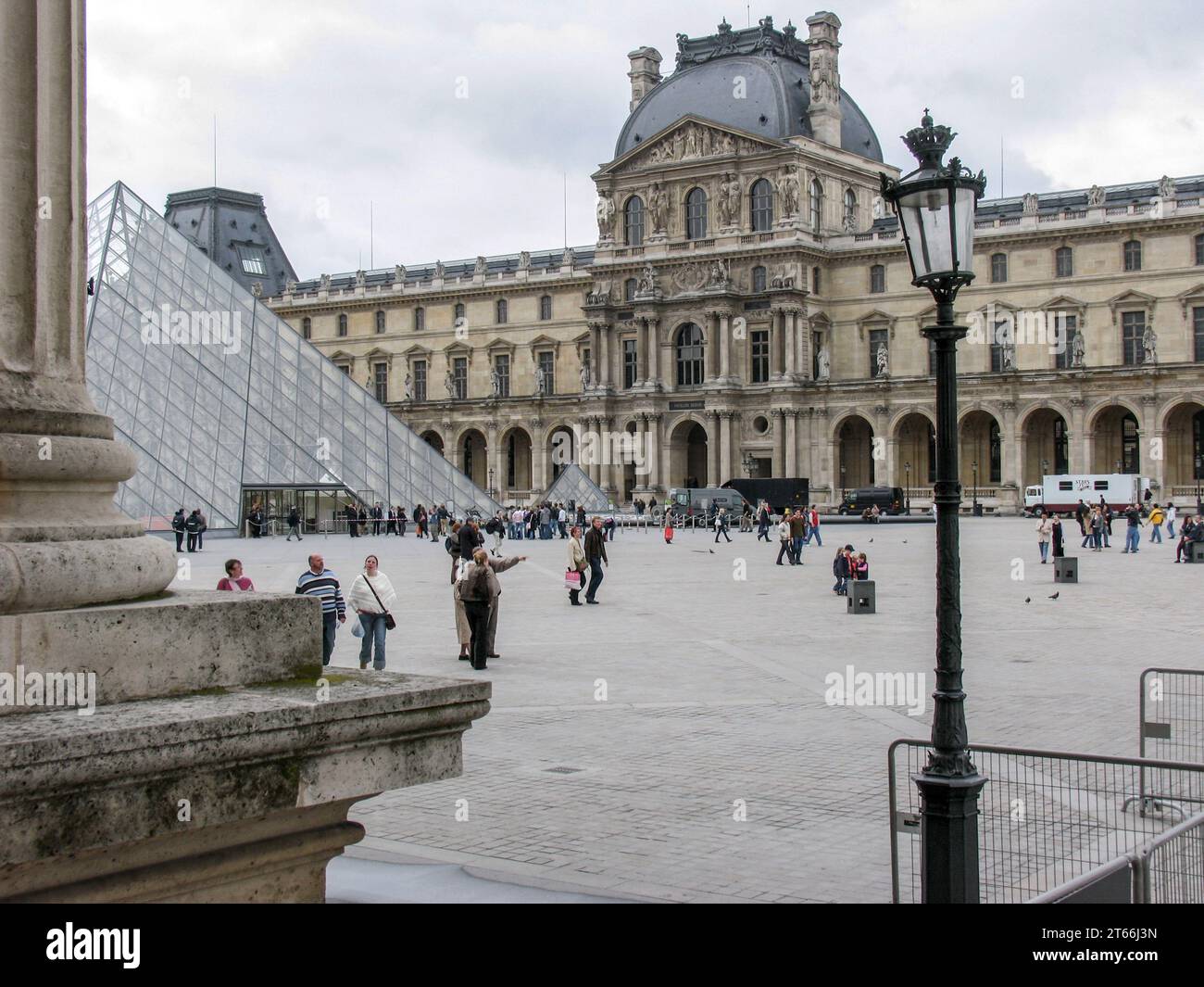 The Louvre and its Pyramid in Paris, France Stock Photo - Alamy