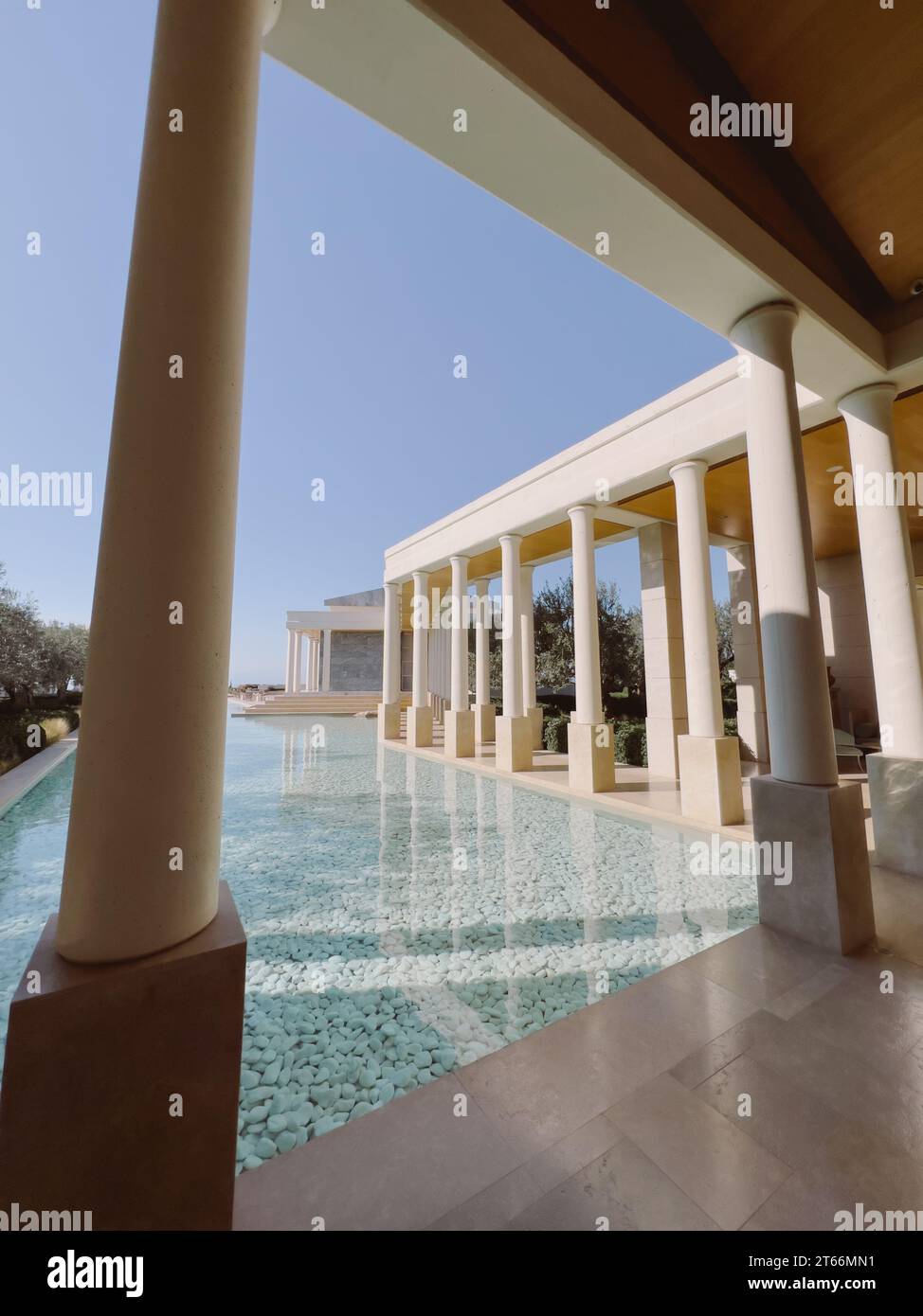 Long terrace with columns along the pool. Hotel Amanzoe, Greece Stock ...