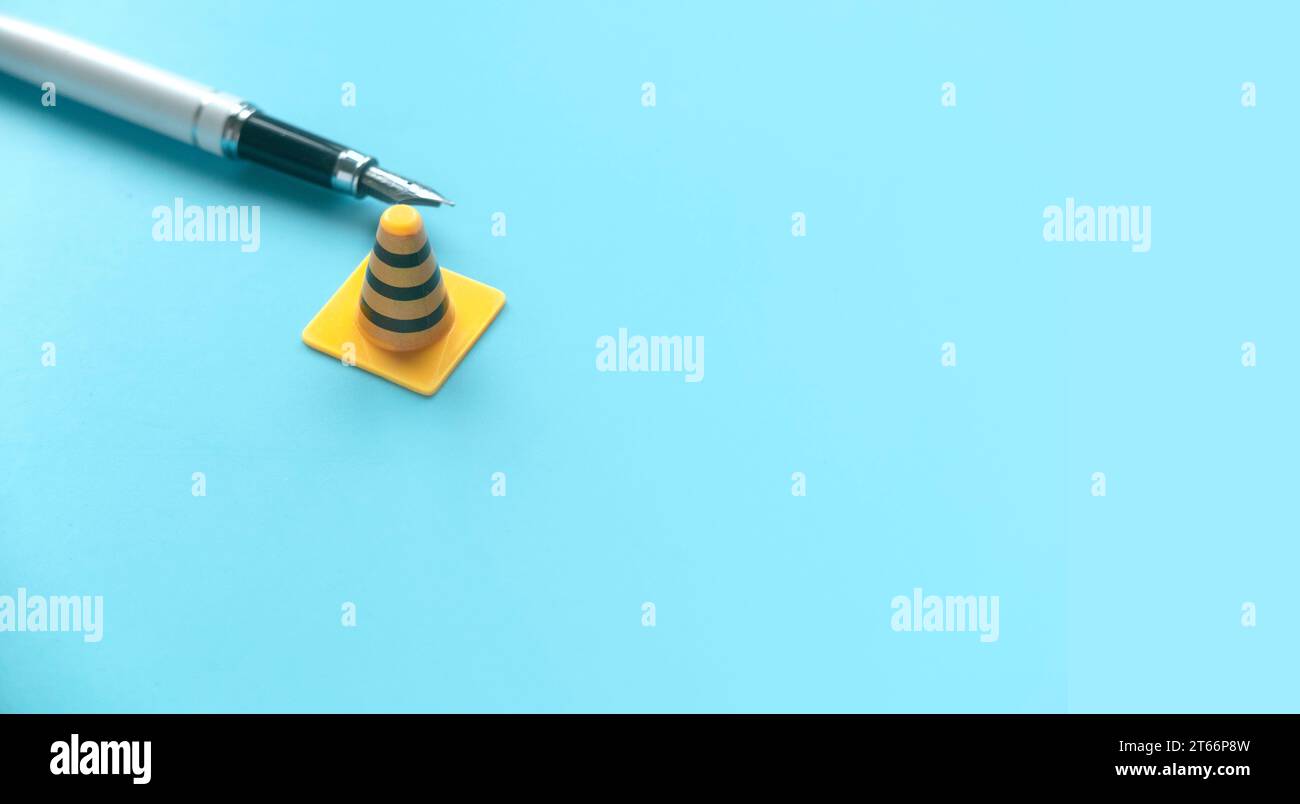 Fixing, maintenance and under construction concept. Pen and traffic ...