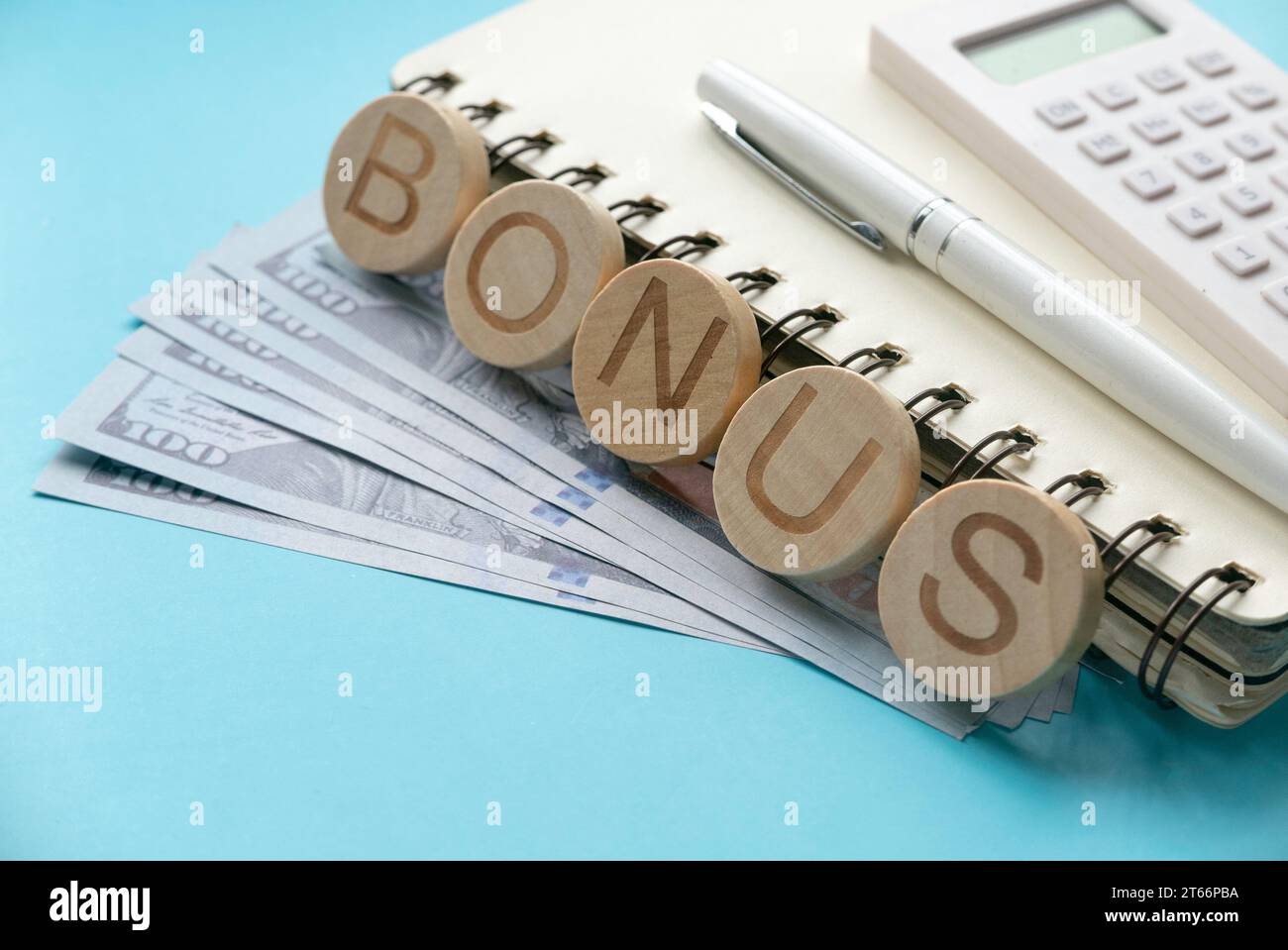 Bonus concept. Dollar money with calculator,pen and notebook Stock ...