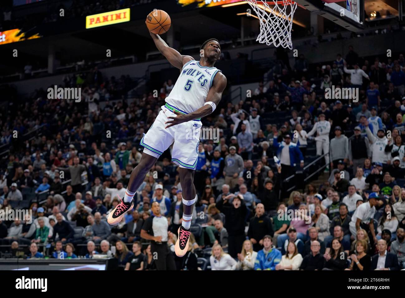 Minnesota Timberwolves guard Anthony Edwards (5) goes up for a dunk ...