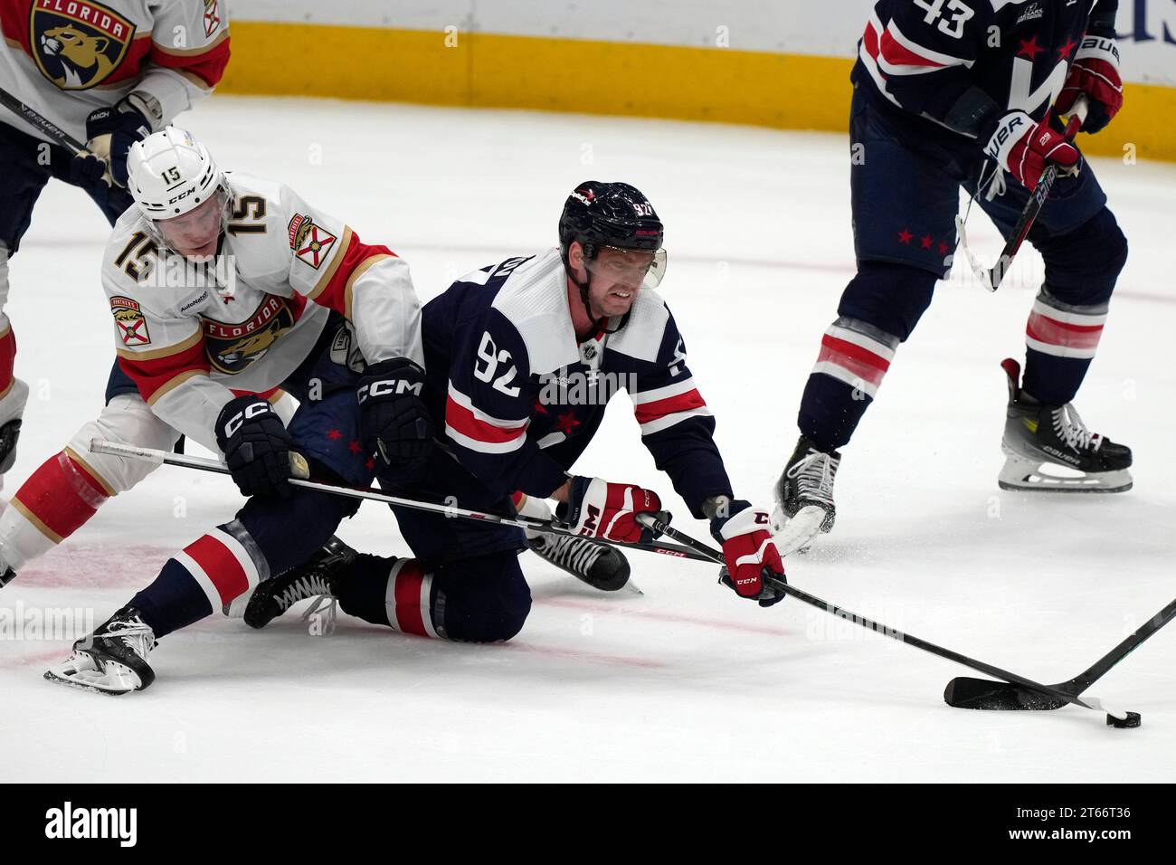 Florida Panthers center Anton Lundell (15) and Washington Capitals center Evgeny Kuznetsov (92 ...