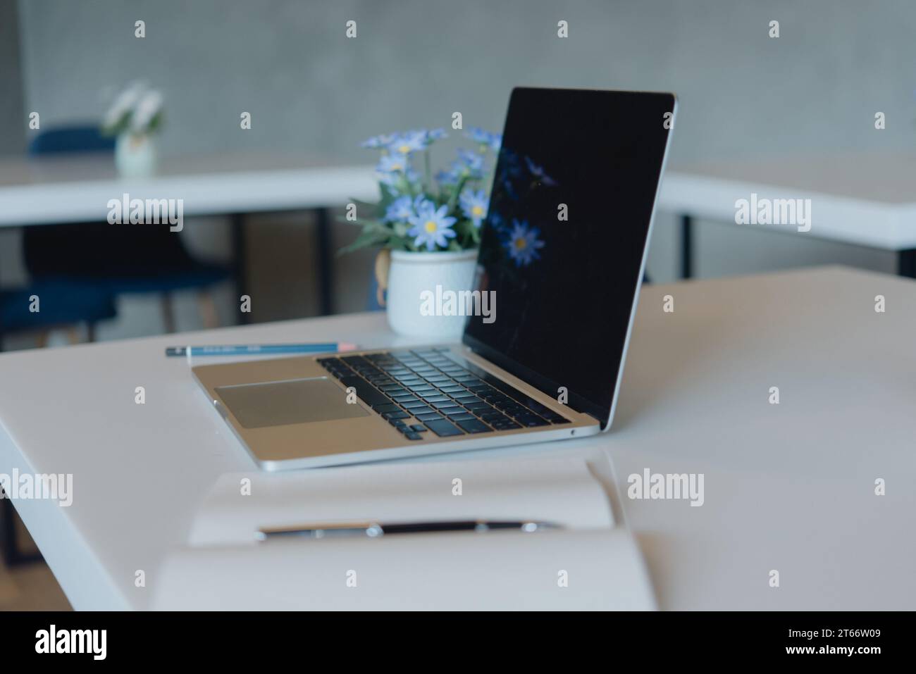 Modern Workspace with Laptop, Pen, and Book on Desk. Productive Office ...