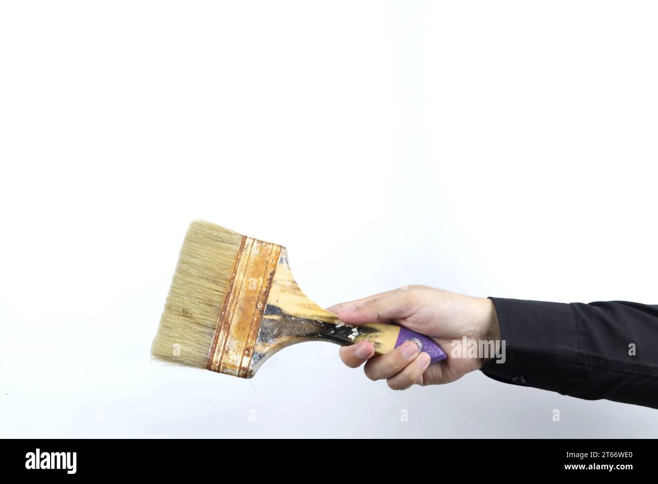 hand holding paint brush Stock Photo - Alamy