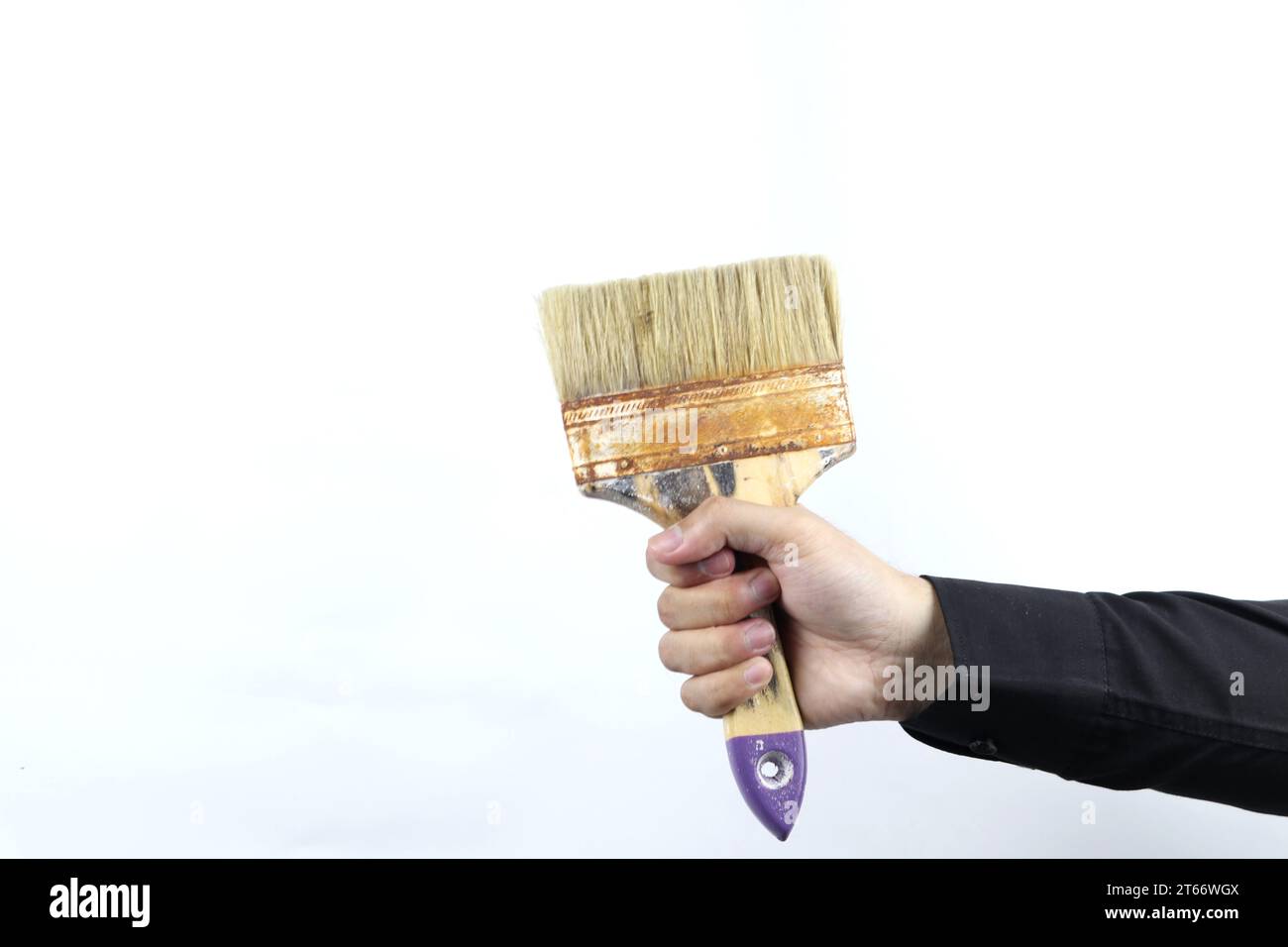 hand holding paint brush Stock Photo - Alamy