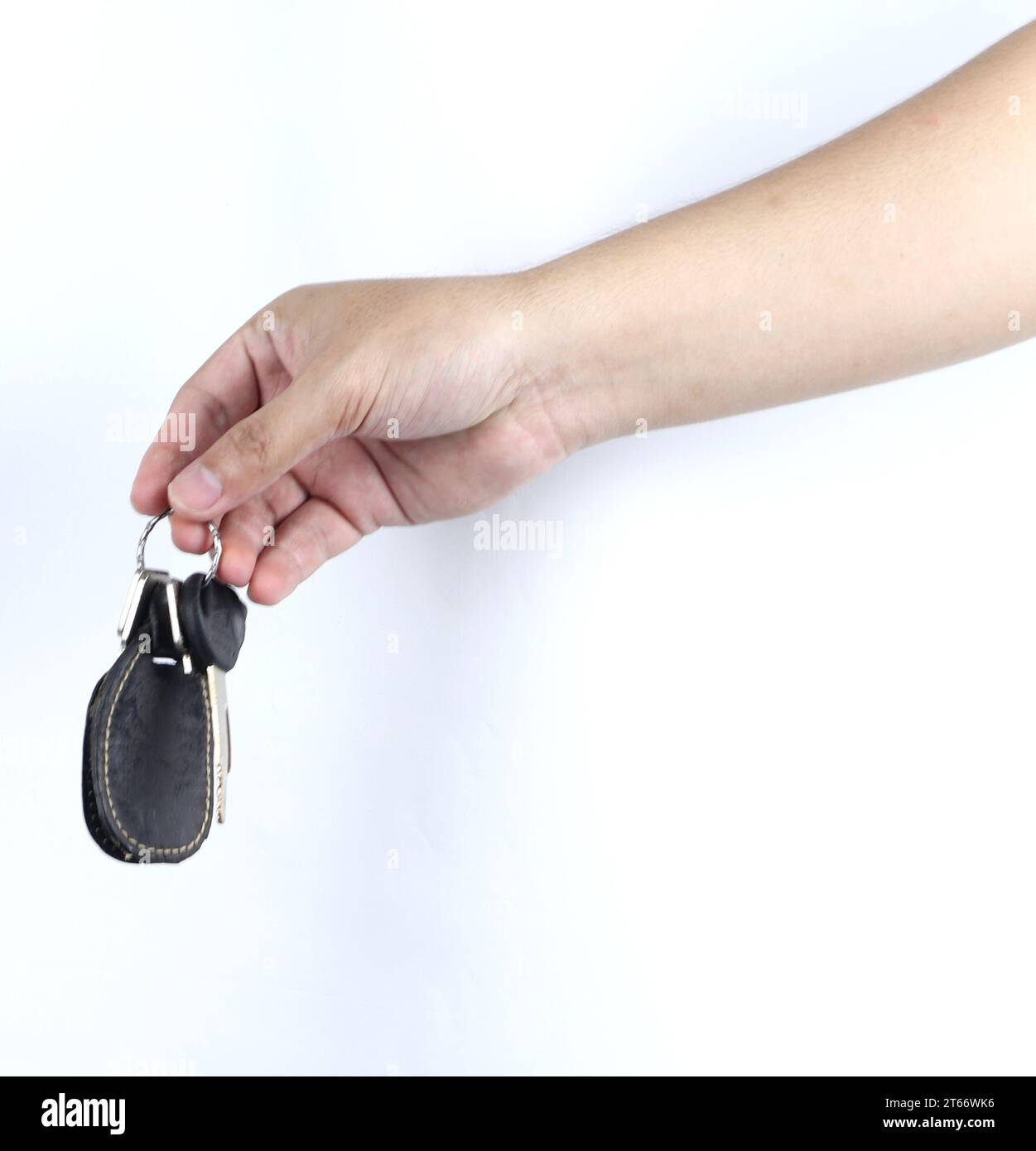 hand holding key Stock Photo - Alamy