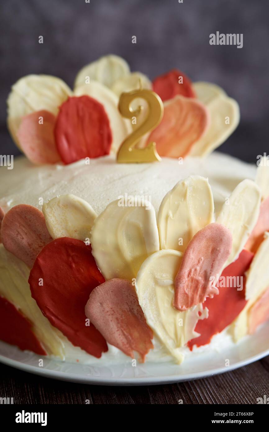 Mastic birthday cake with colorful chocolate petals. Caption: 2 Stock ...