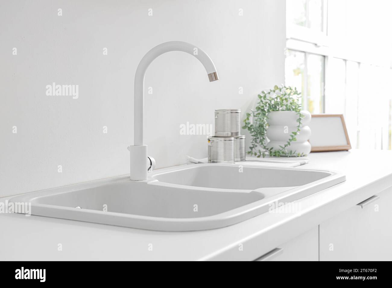 White counter with sink in interior of modern kitchen, closeup Stock ...