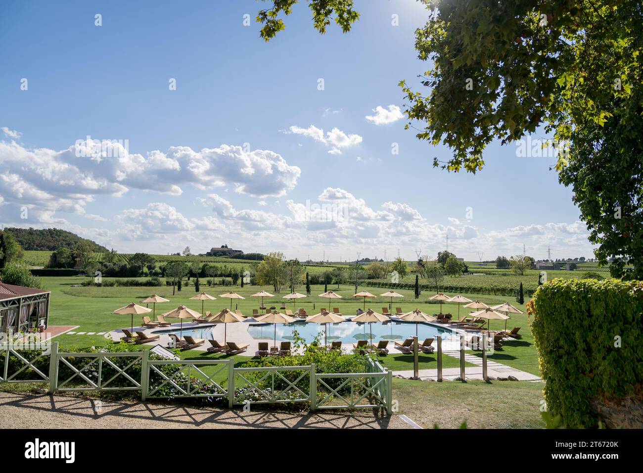 Sun loungers with sun umbrellas around the pool. Villa Cordevigo ...