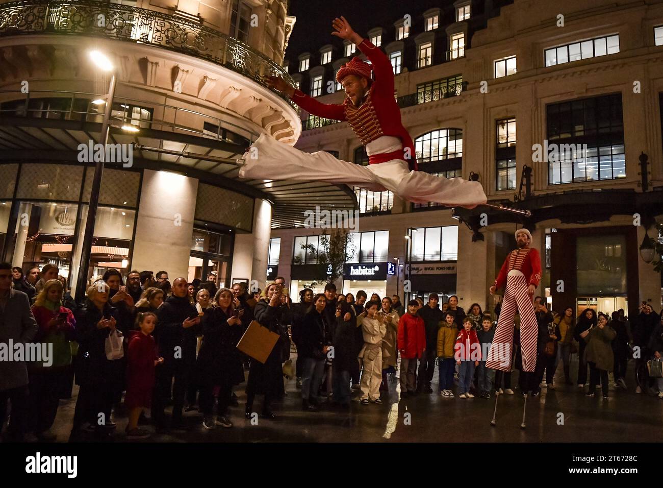 Acrobats perform during the ceremony of Samaritaine's Christmas window ...