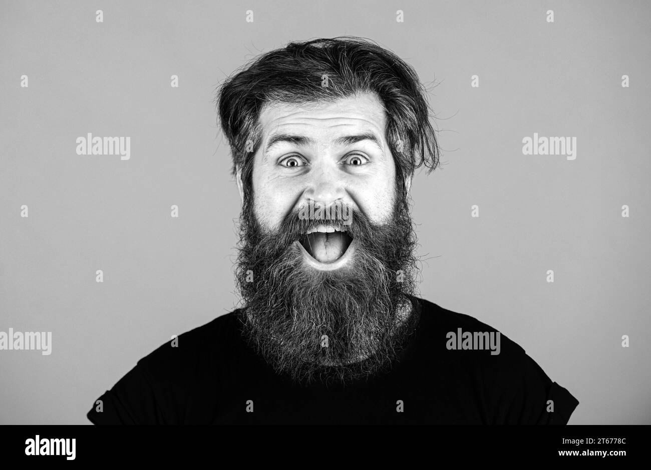 Happy man smile face. Handsome smiling young guy with long beard and ... Happy man smile face. Handsome smiling young guy with long beard and ...