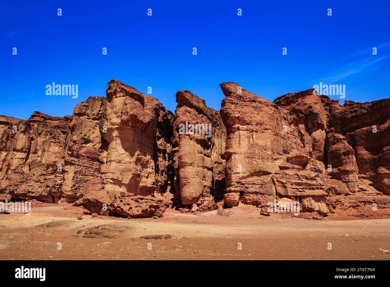 Panoramic view of the red Sandstone cliffs in Timna Valley called after ...