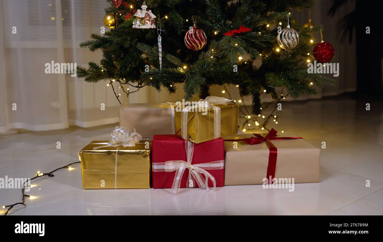 Gifts appear under the tree - frame-by-frame animation. Decorated ...