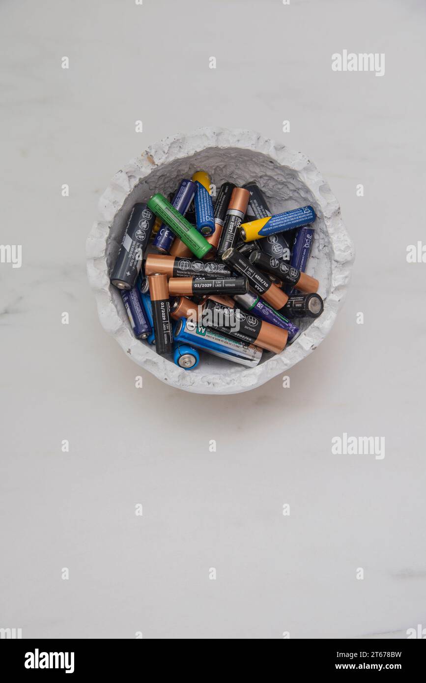 Color batteries of different sizes on a white background Stock Photo ...