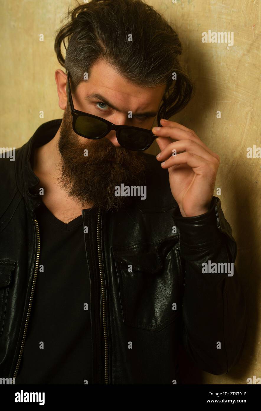 Brutal angry gang man lifestyle, serious handsome guy. Bearded hipster ...