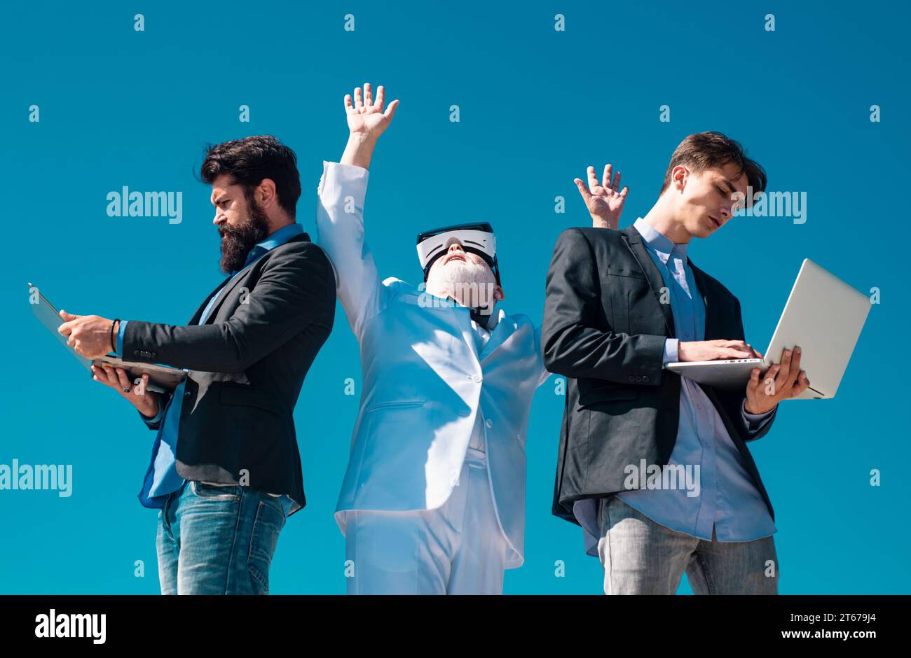 Business teamwork. Coworkers. Team with laptop and vr. Business people ...