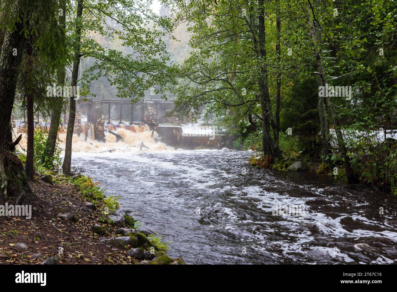 Landscape of Volchya river with the Old Finnish hydroelectric plant on ...