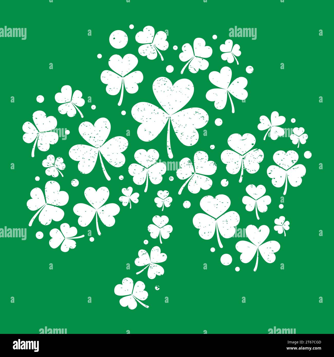 White distressed shamrock shape made with small shamrocks on green ...