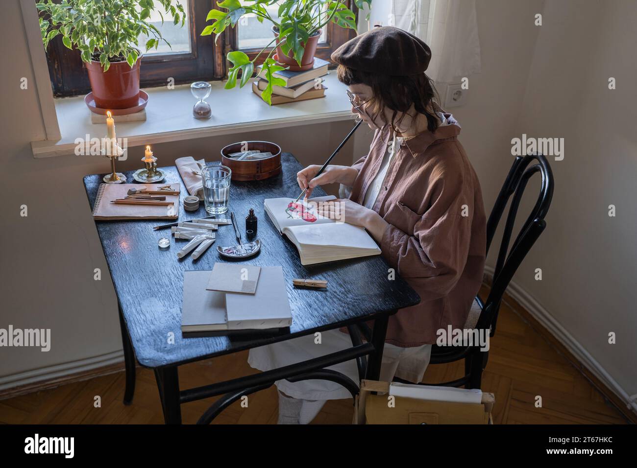 Professional artist drawing colorful picture in cozy studio, workshop ...